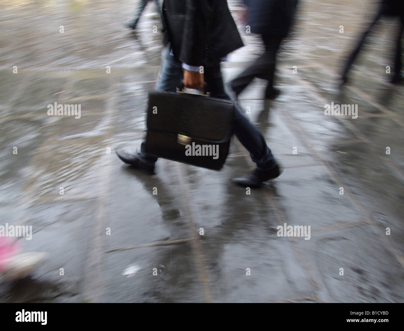 one person walking in street in city town Stock Photo - Alamy
