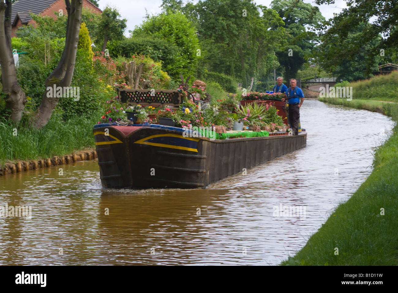 A British Waterways Narrow Boat Bedecked with Flowers for Floating ...