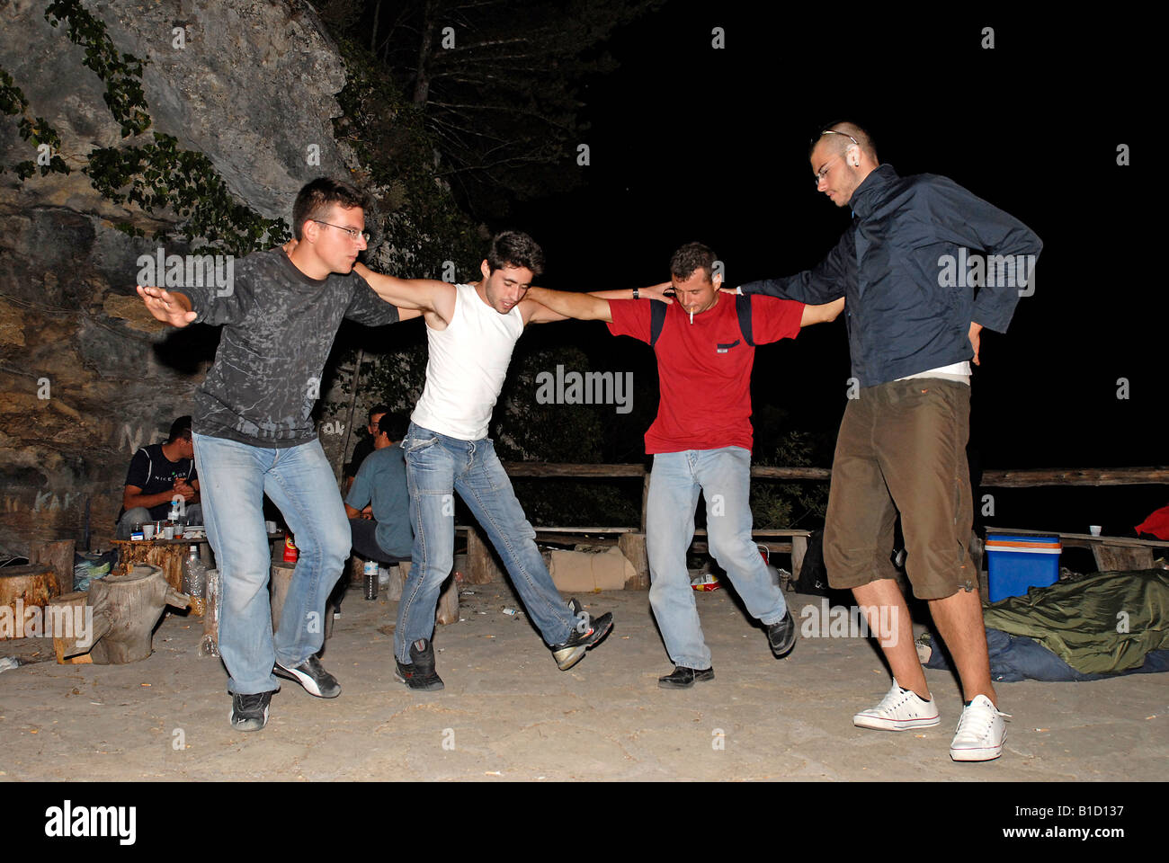 Young greek men dancing Stock Photo - Alamy
