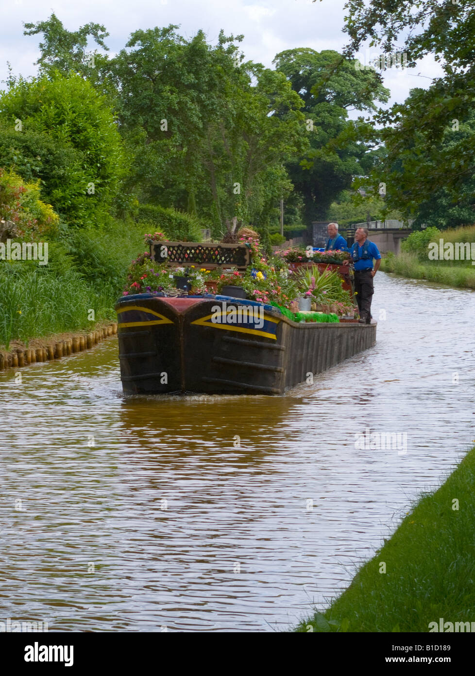 A British Waterways Narrow Boat Bedecked with Flowers for Floating ...