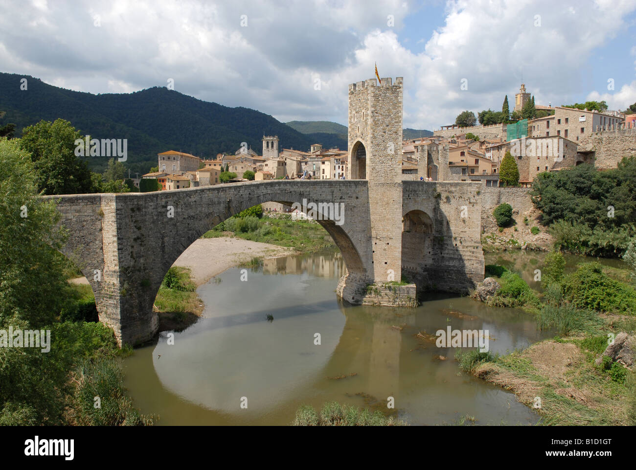 The ancient bridge crossing the River Fluvia at Besalu in Spain Stock ...