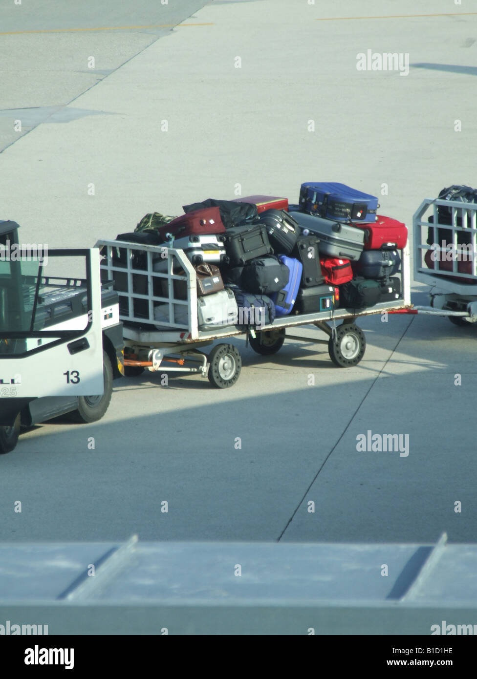 passenger luggage being transported at airport Stock Photo - Alamy
