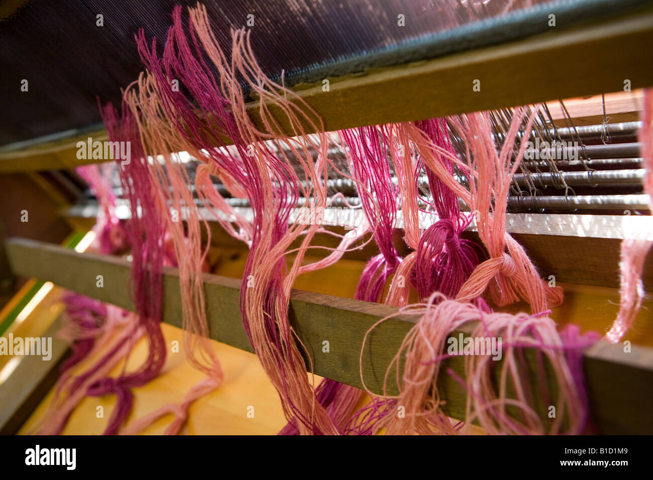 Wool on a loom Stock Photo - Alamy