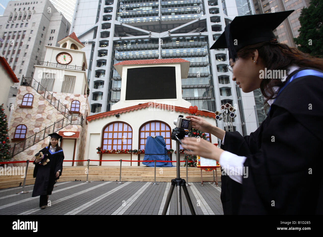 University graduates taking pictures of each other in Central district ...