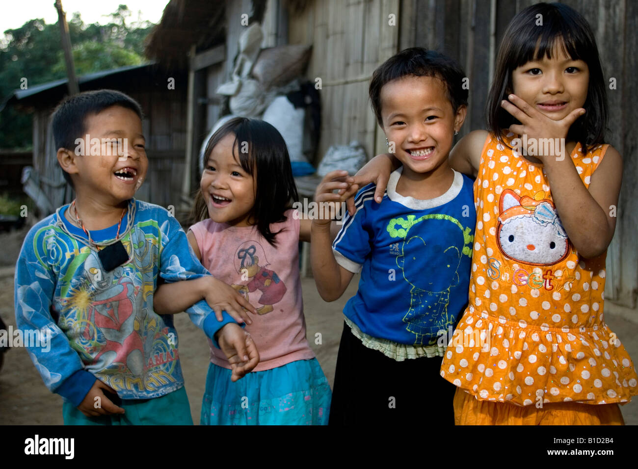 Kids from the Lisu tribe having a laugh Stock Photo - Alamy