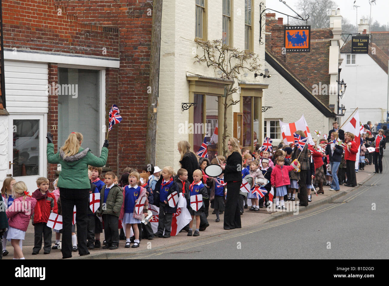 Schoolchildren celebrate St. George's Day with a parade through the ...