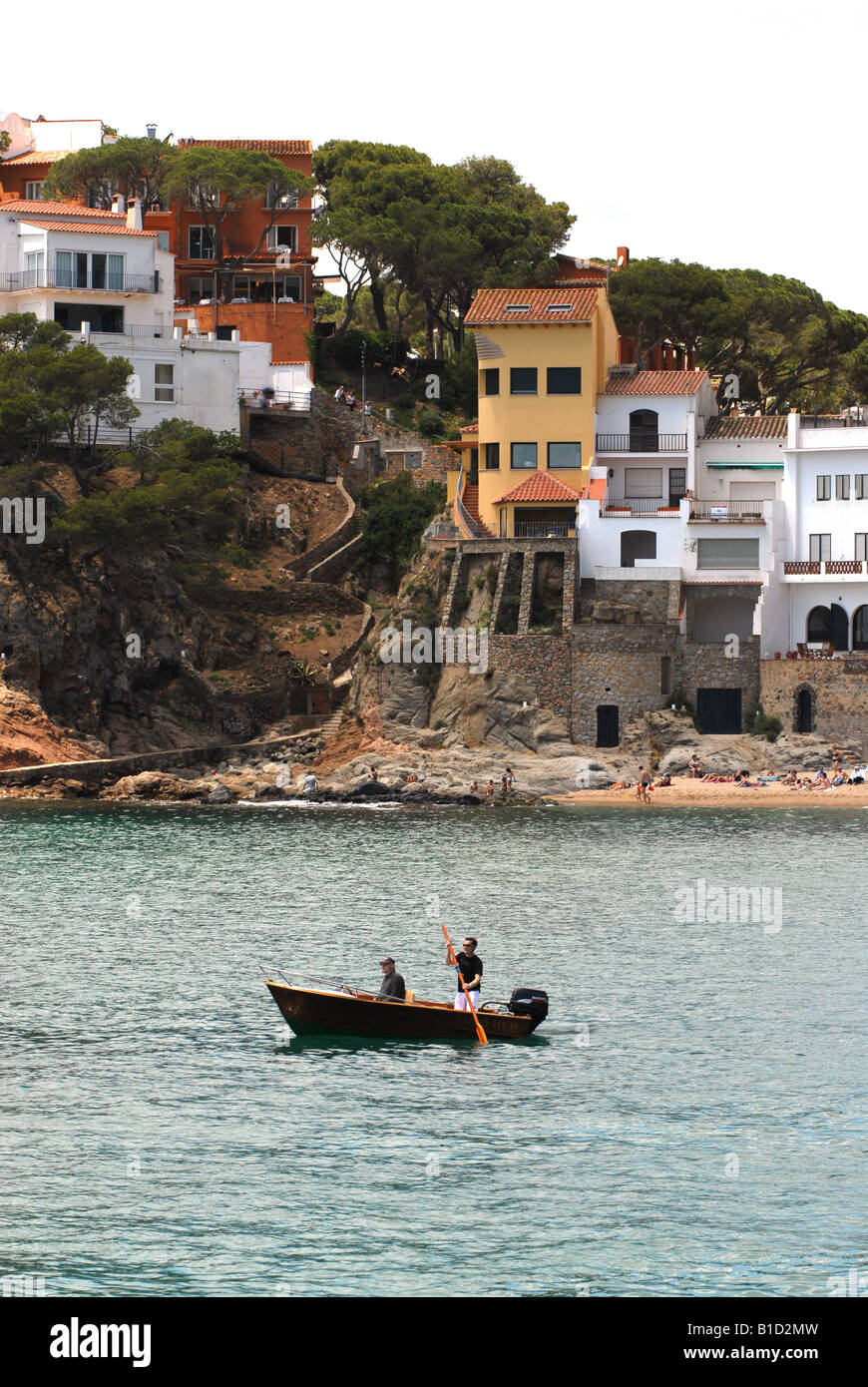 Men rowing boat at Llafranc on the Costa Brava Spain Stock Photo - Alamy