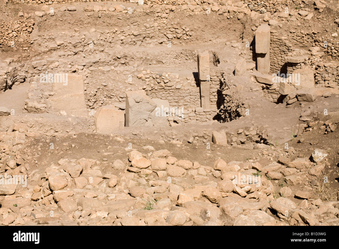 Standing stones with in the walls at The Neolithic site of Gobekli Tepe ...