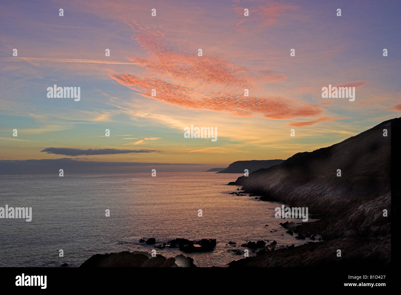 Sunset over the Gower peninsula Stock Photo - Alamy