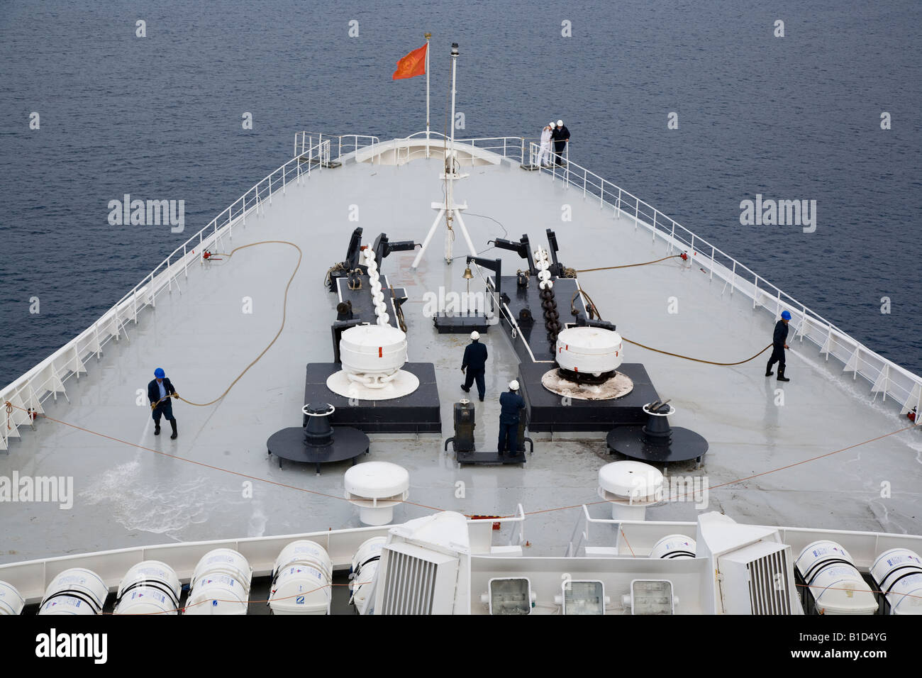 Cunard QE2 bow bring up the anchor chain deck officers points position ...