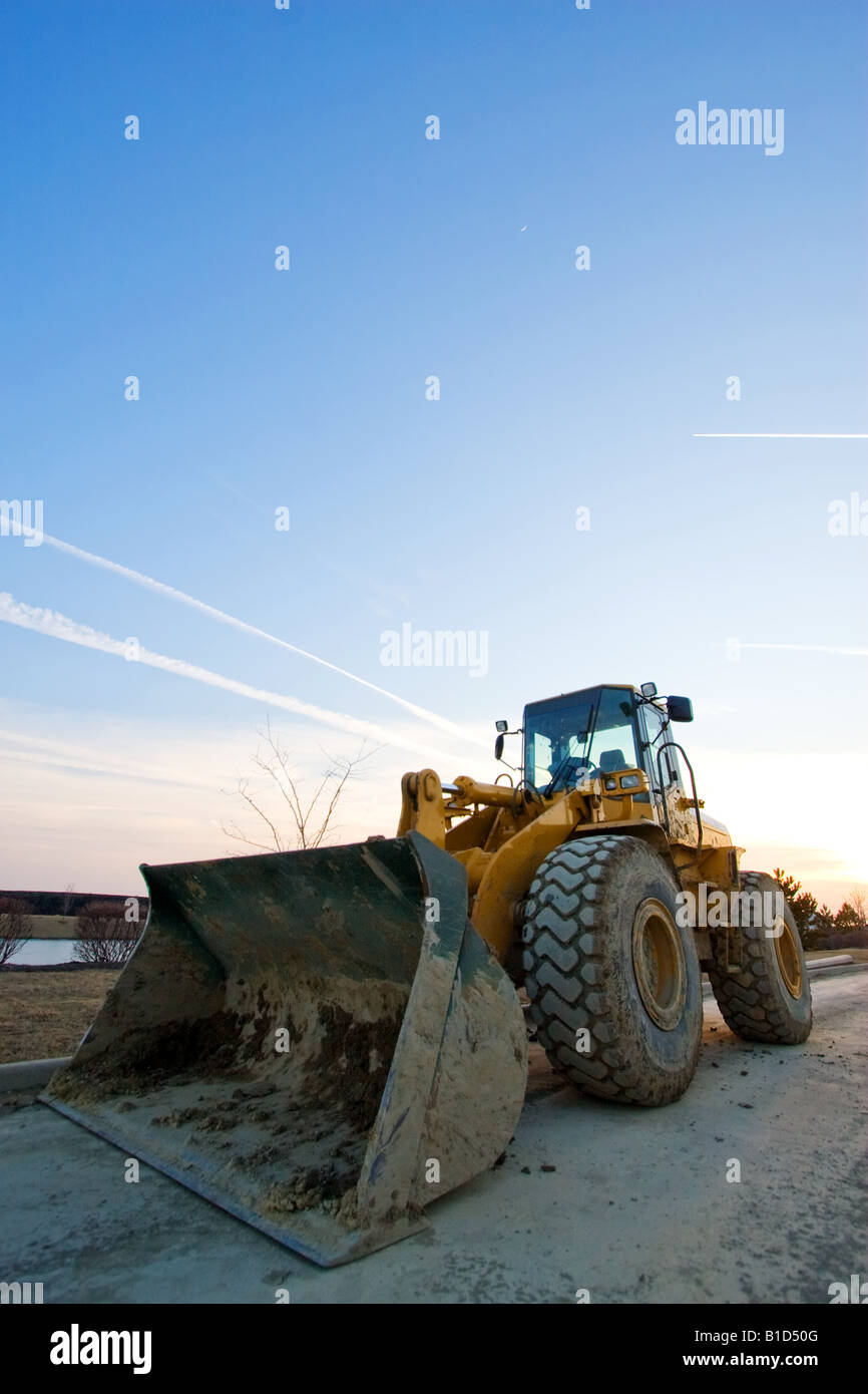 A front end loader at a construction site Stock Photo - Alamy