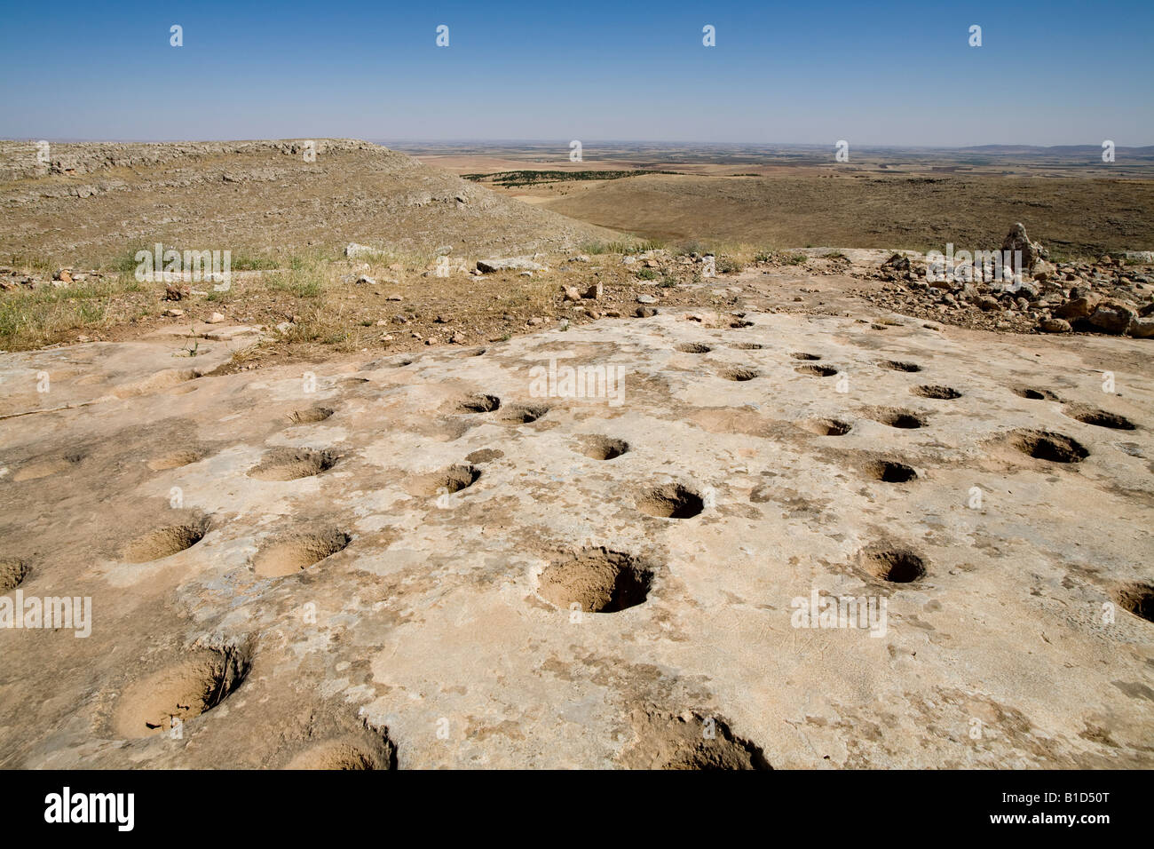 View of post holes in bedrock at The Neolithic site of Gobekli Tepe in ...
