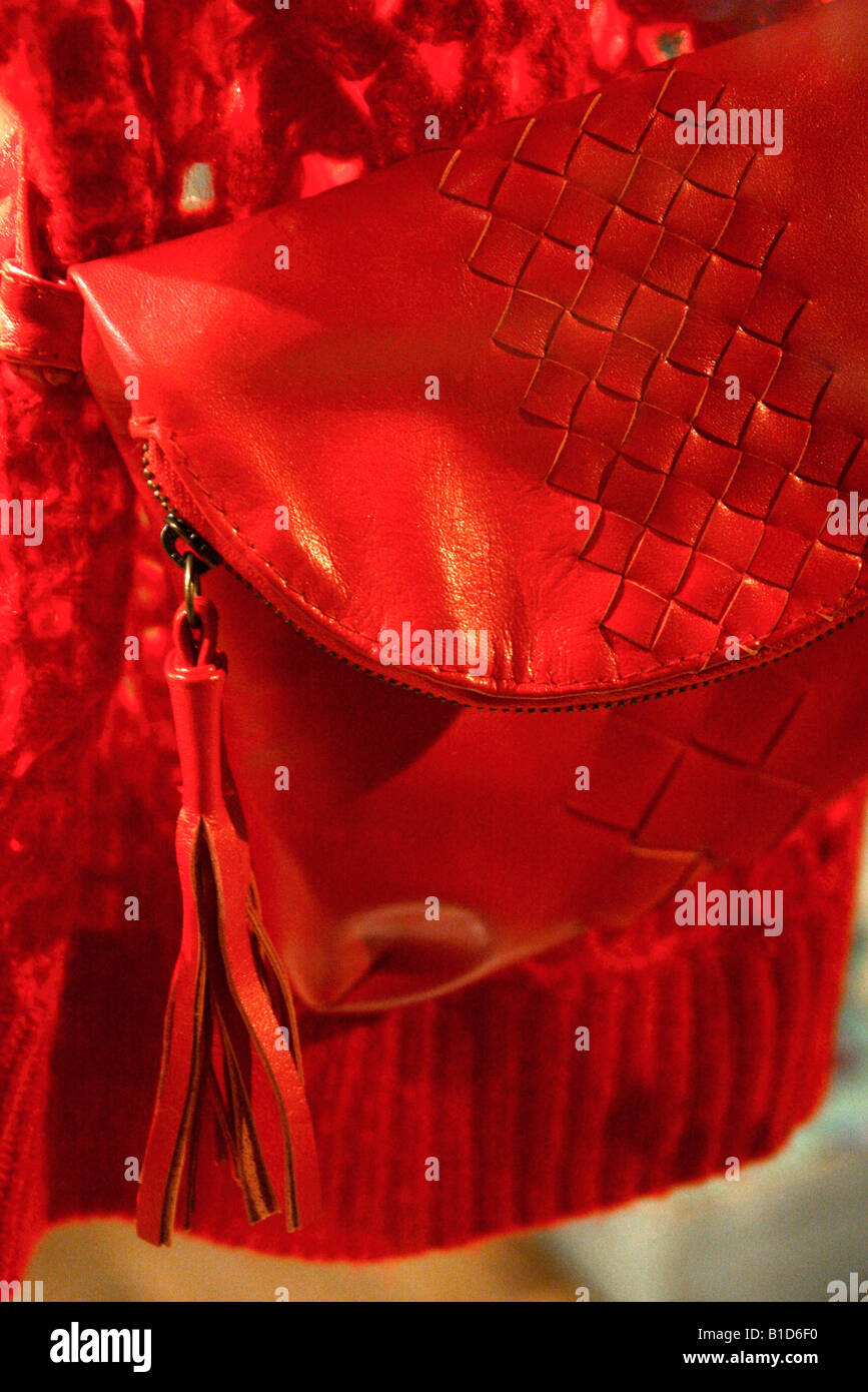 Red Handbag in shop window Stock Photo - Alamy