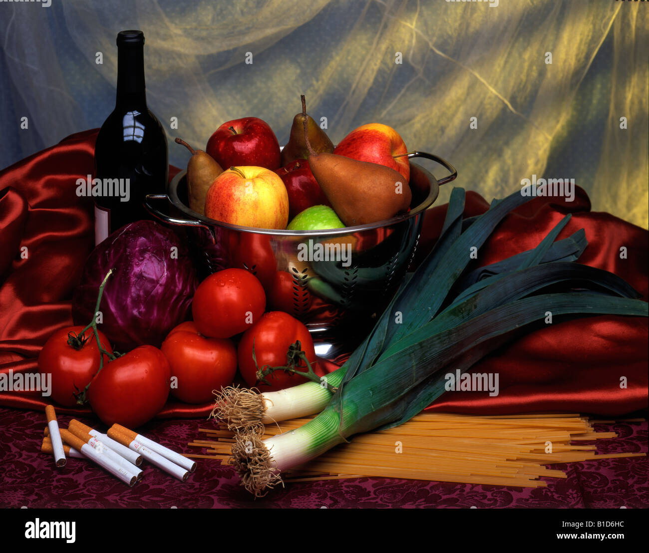 Still life with fruit, wine and cigarettes Stock Photo - Alamy