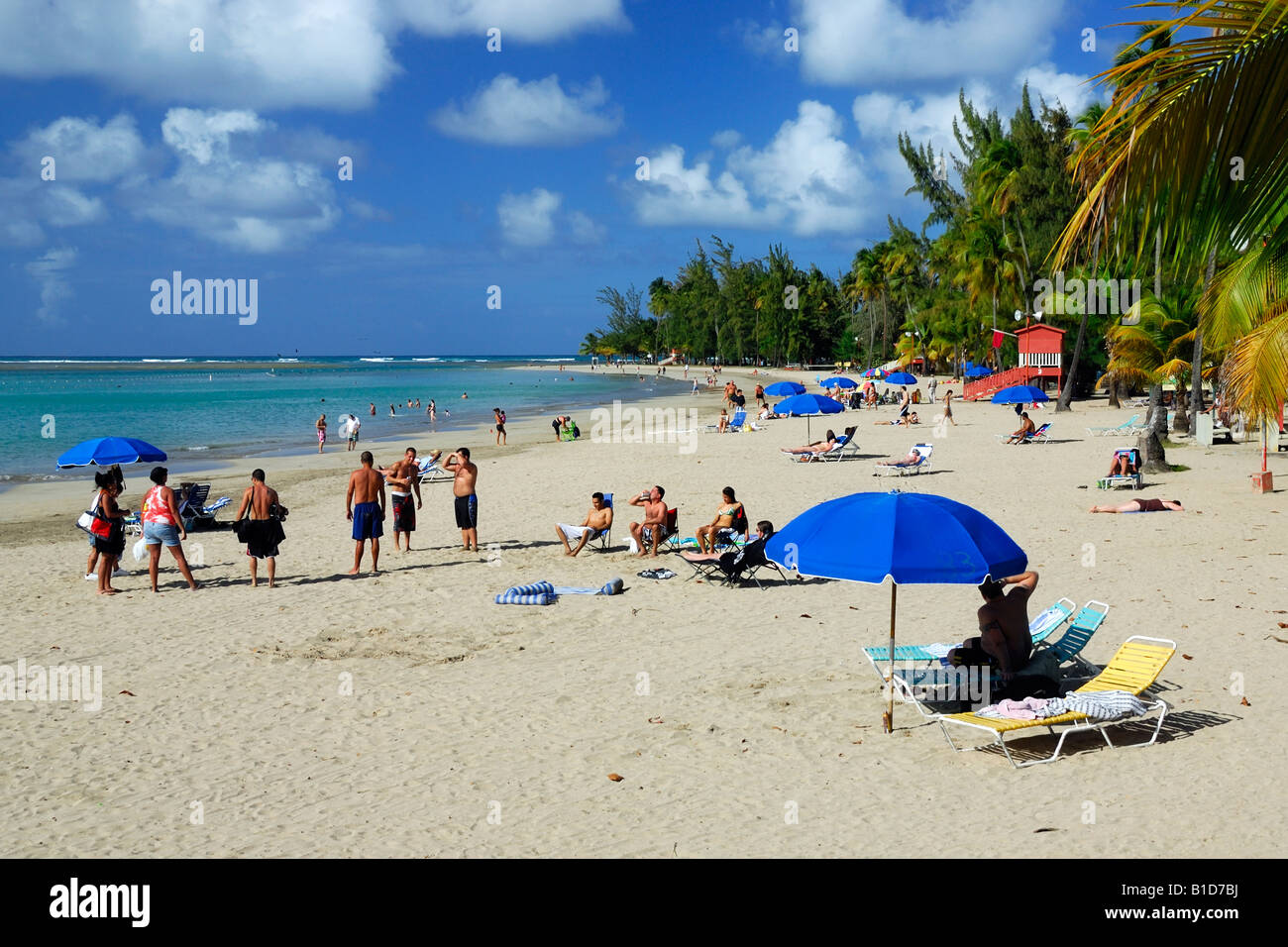 People enjoy a beautiful afternoon at the Luquillo Beach (Balneario ...