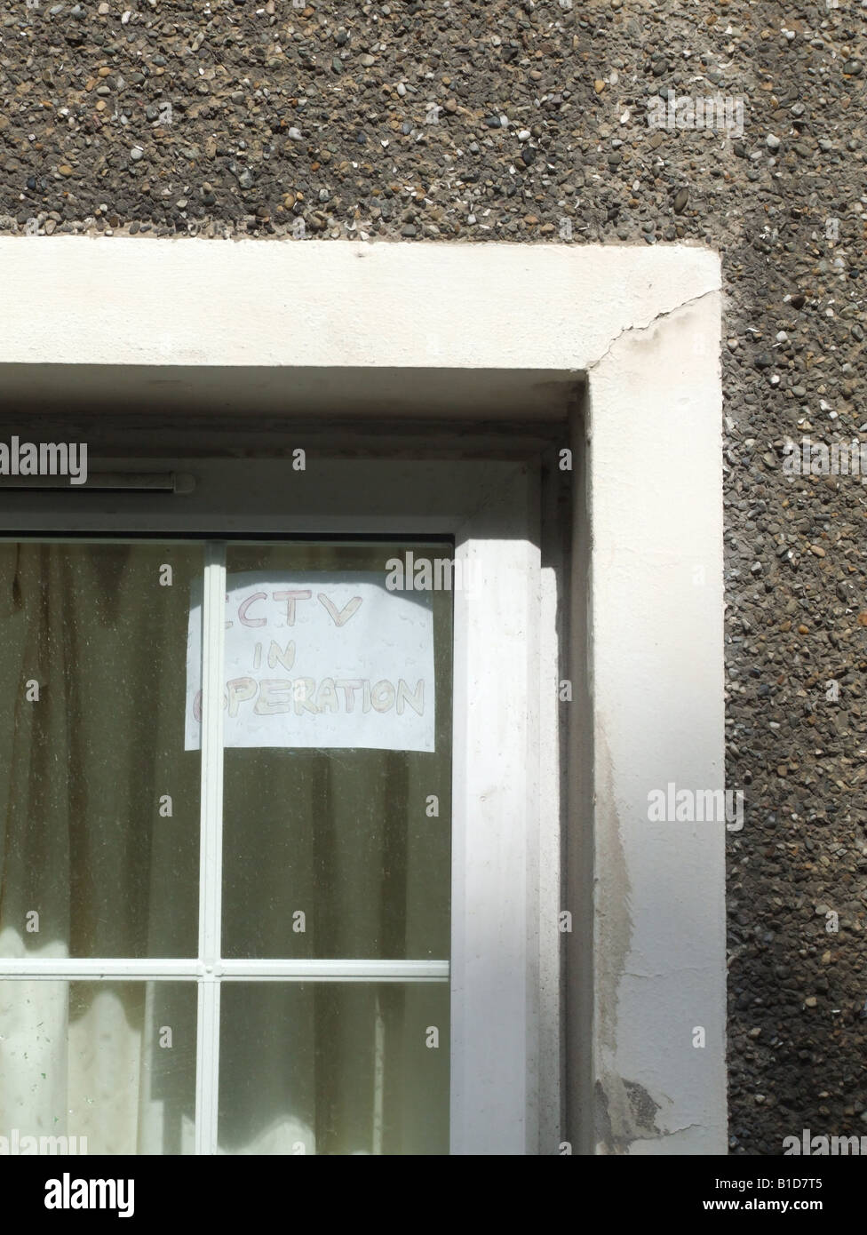 cctv sign in house window Stock Photo - Alamy