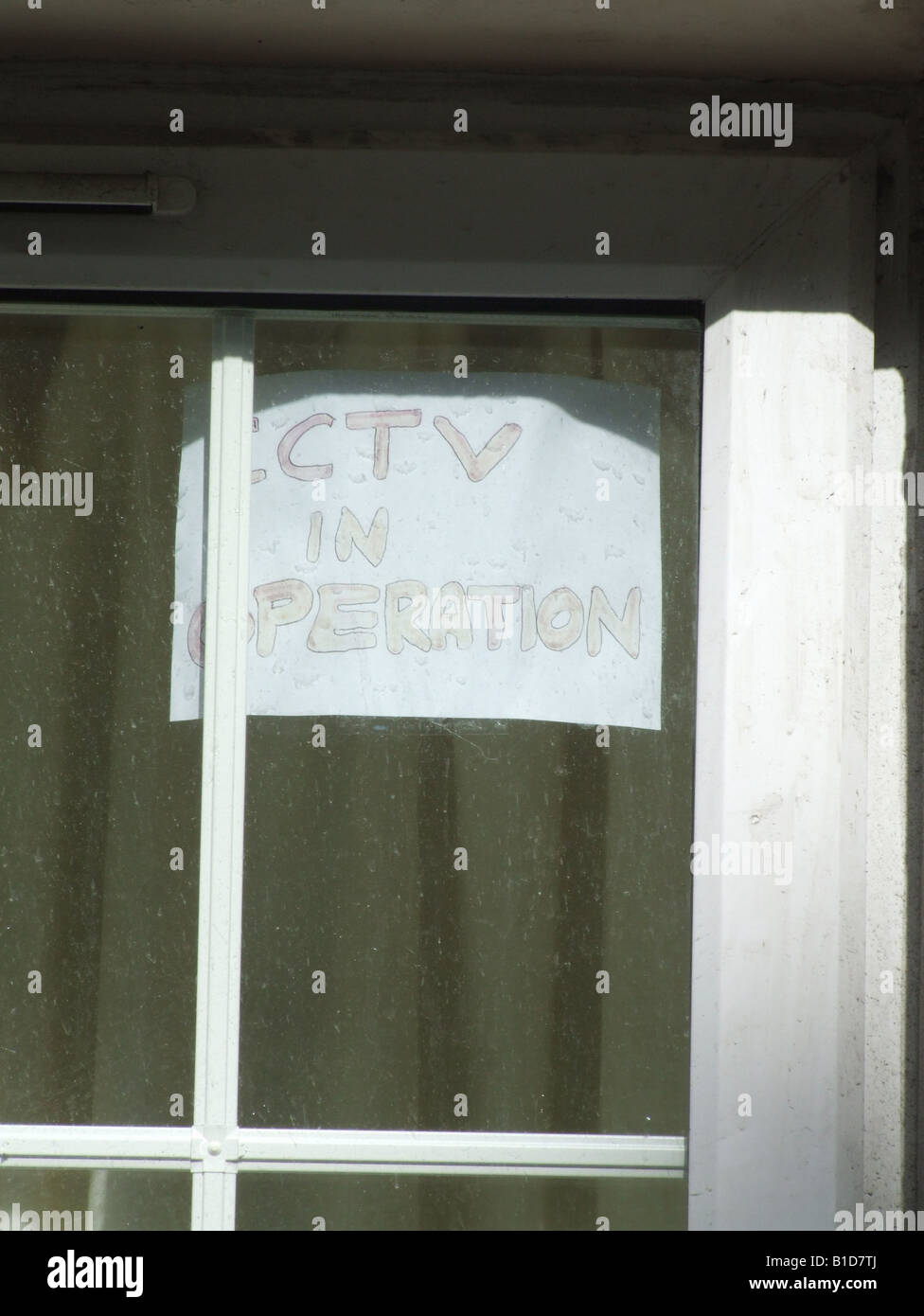 cctv sign in house window Stock Photo - Alamy