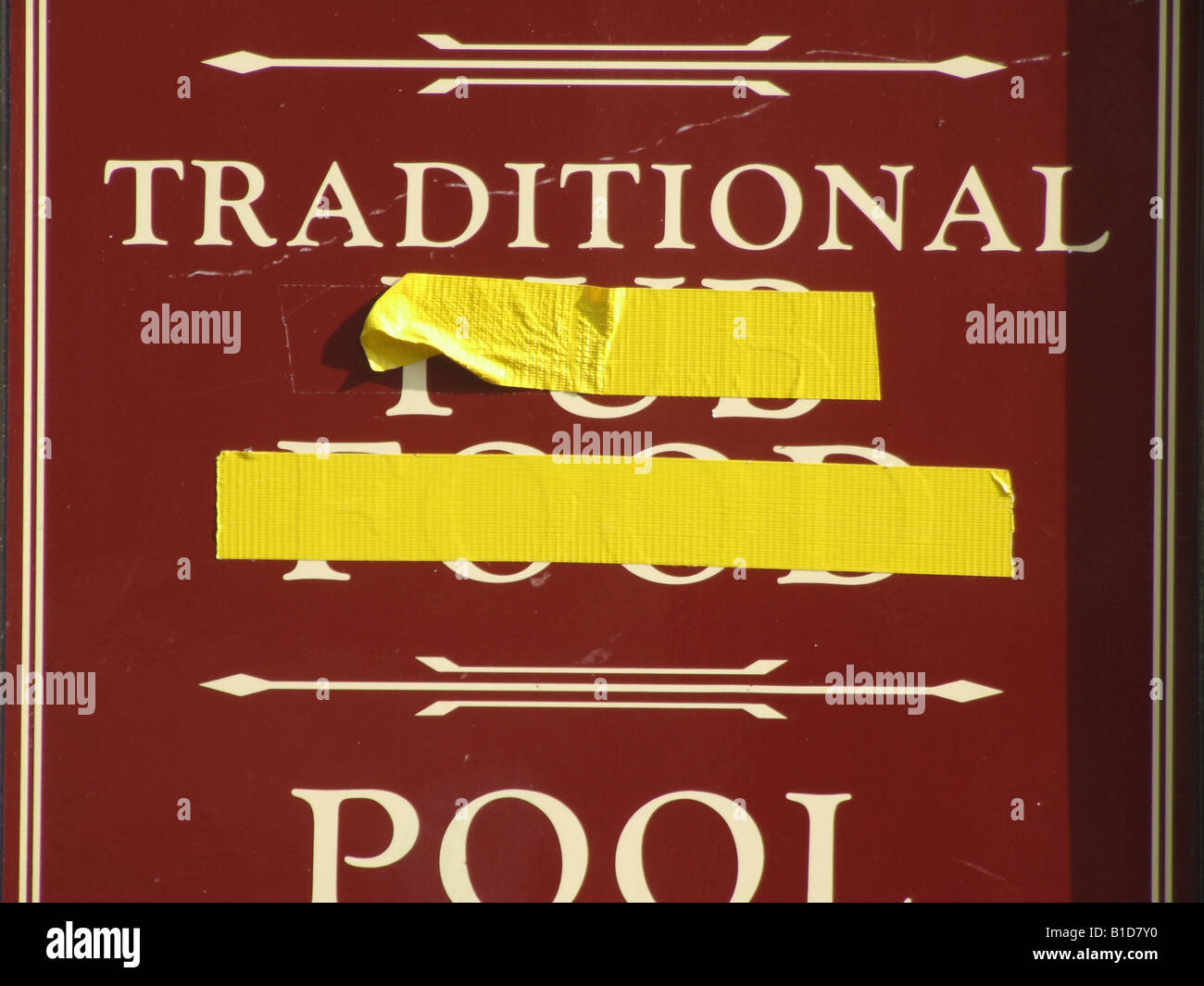 pub food sign covered with yellow tape Stock Photo - Alamy