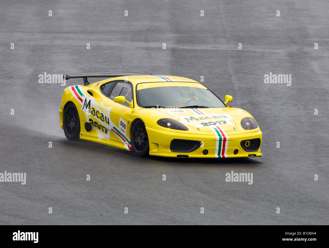 Yellow Ferrari Challenge Stradale racing at Fuji Speedway Stock Photo ...
