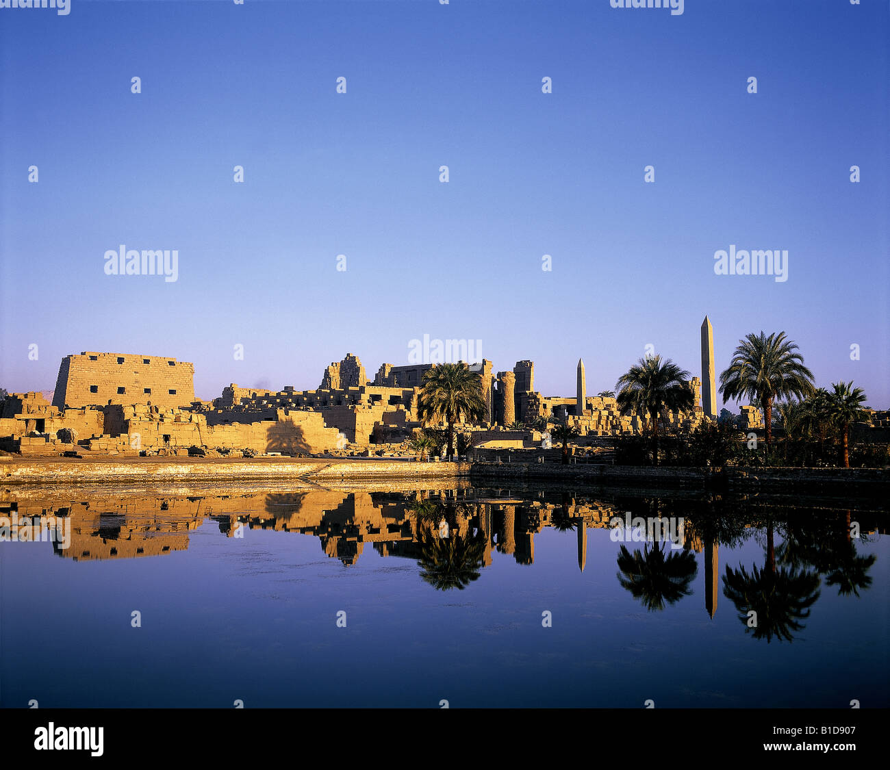 Sacred lake and Temple of Amon at Karnak Egypt Stock Photo - Alamy