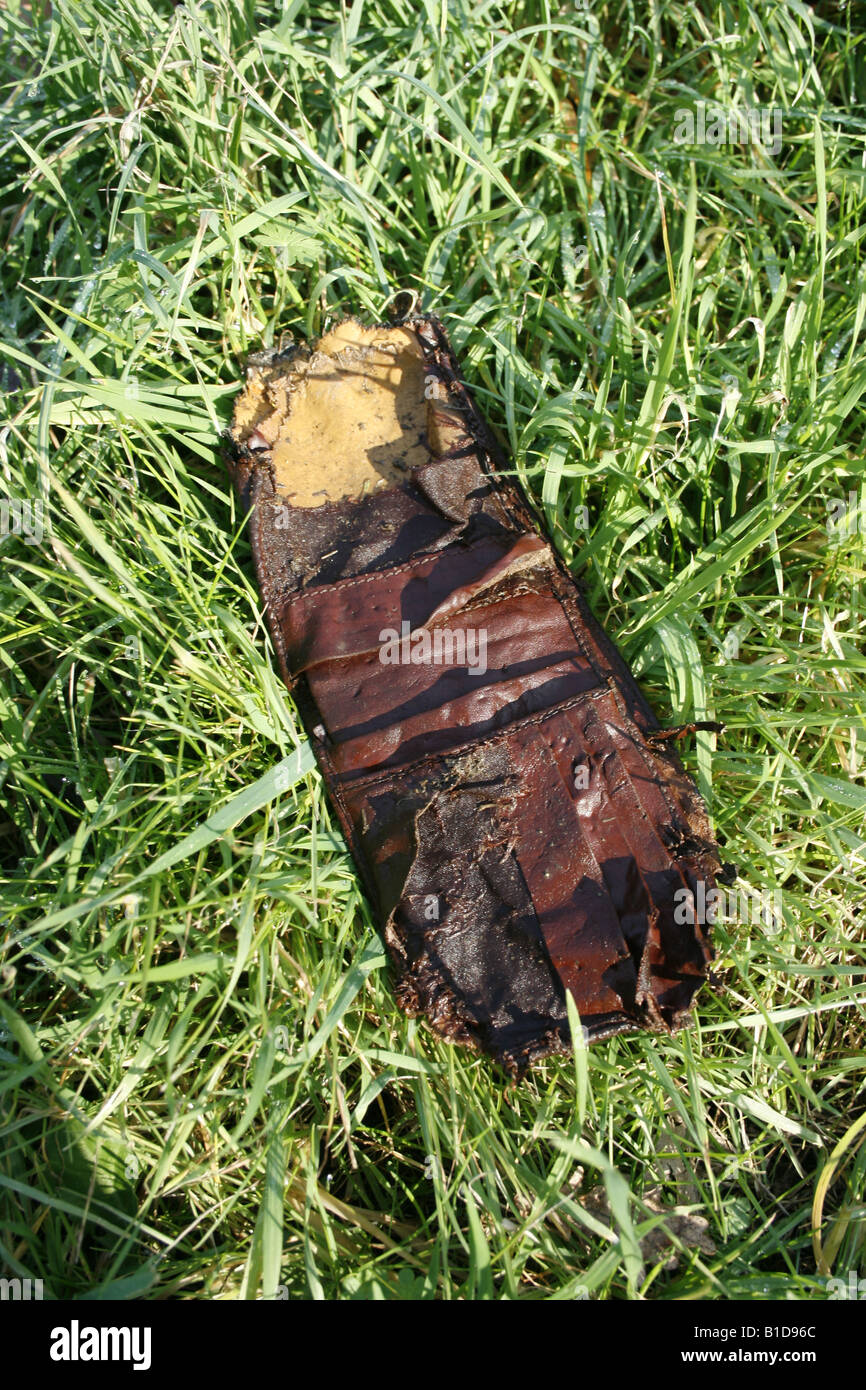 one damaged wallet left in countryside Stock Photo - Alamy