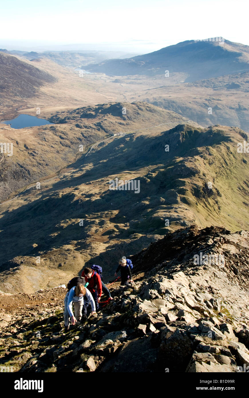 Walkers on the ridge Crib Goch Snowdonia Stock Photo - Alamy