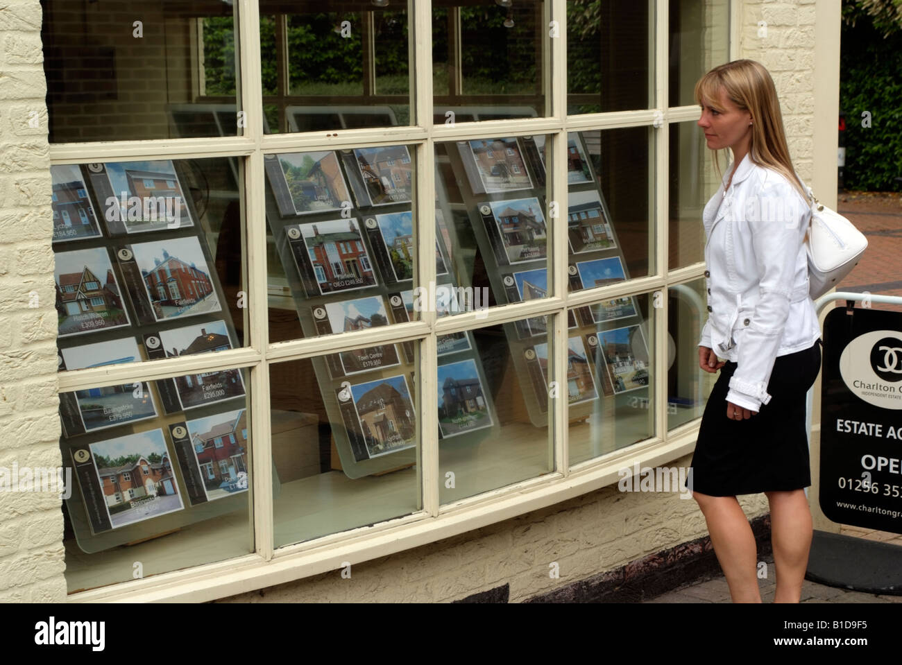 Real Estate Agent Shop Window High Resolution Stock Photography and ...