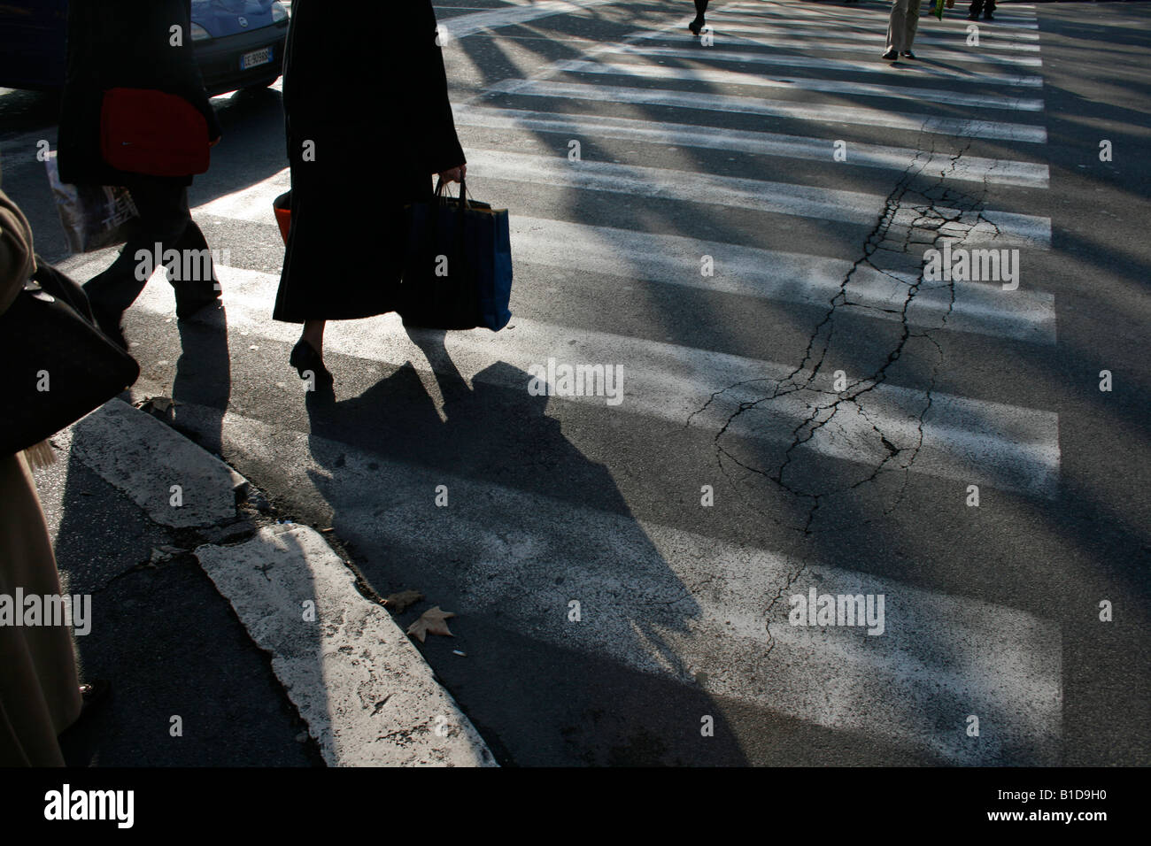 detail of people on zebra crossing in city town Stock Photo - Alamy