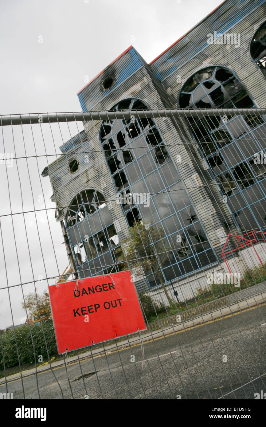 Danger Keep Out sign outside disused and burnt-out factory, Ladysmith ...