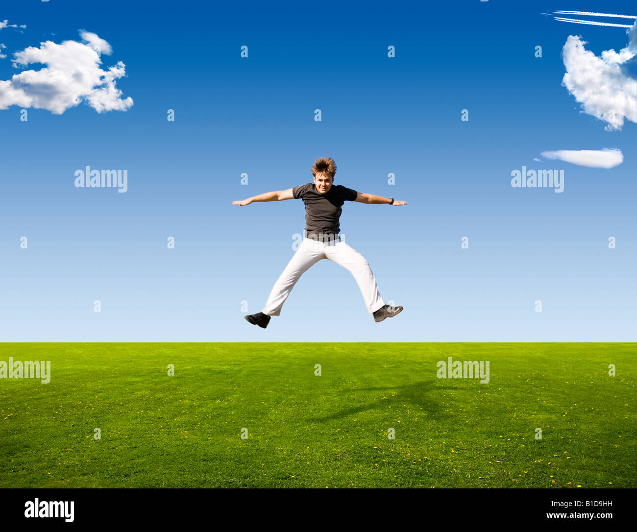 Happy jumping man on summer landscape background Stock Photo - Alamy