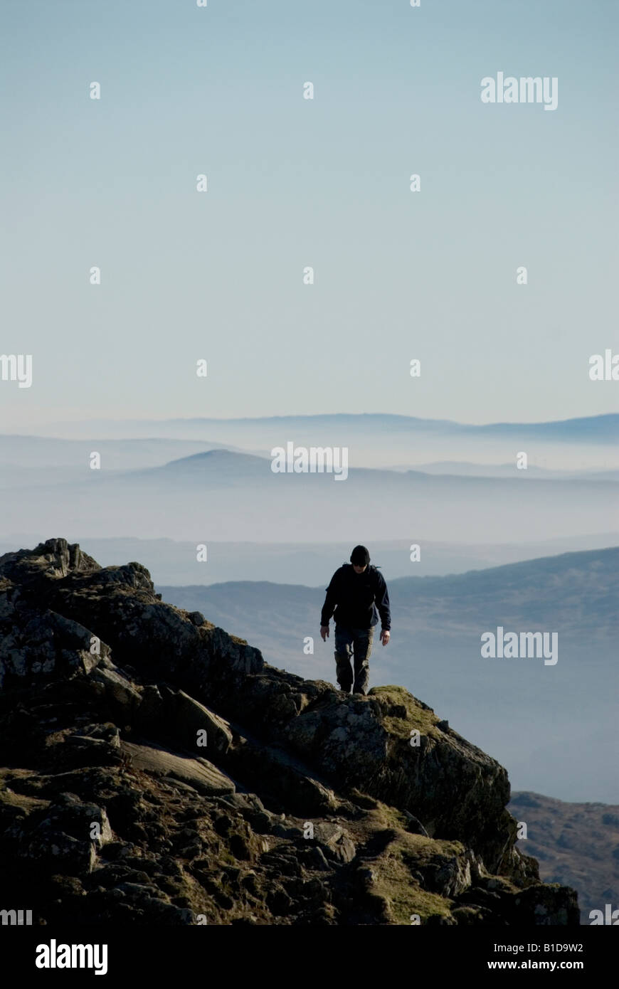Lone walker on the ridge Crib Goch Snowdonia Stock Photo - Alamy