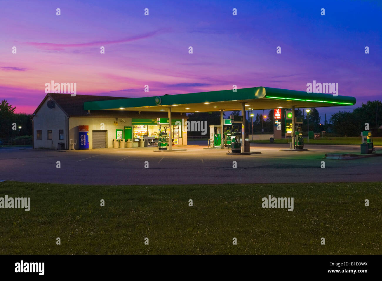 BP petrol station at night in the UK, at Long Sutton in Lincolnshire ...