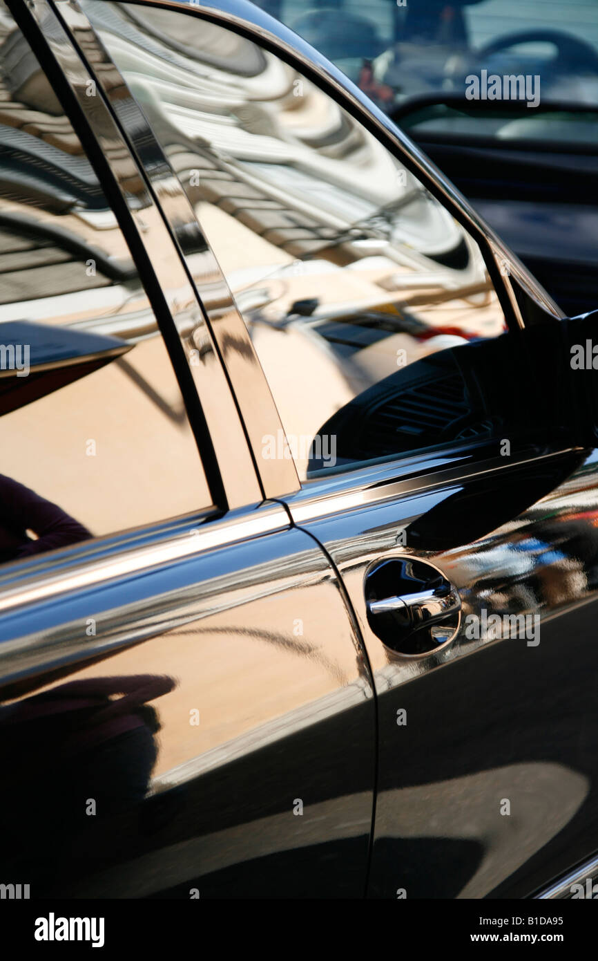 luxury black car backlit in morning sun Stock Photo - Alamy