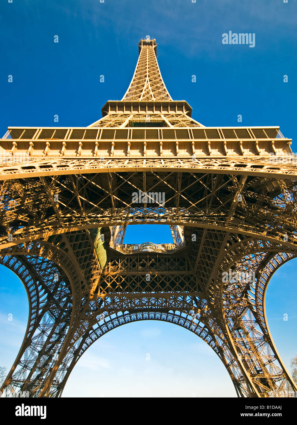 Wide angle shot of the Eiffel Tower Paris from below, looking up ...