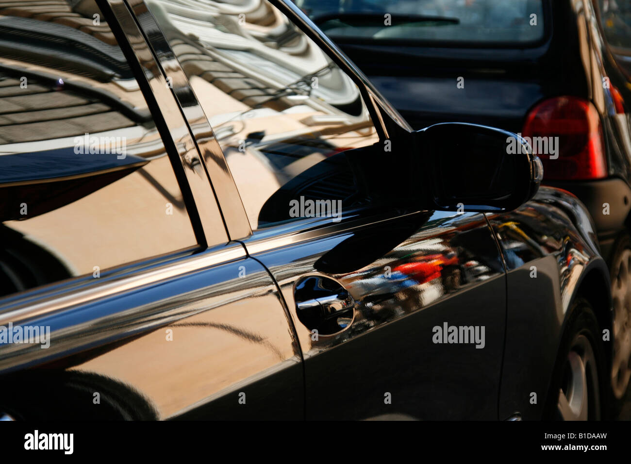 luxury black car backlit in morning sun Stock Photo - Alamy