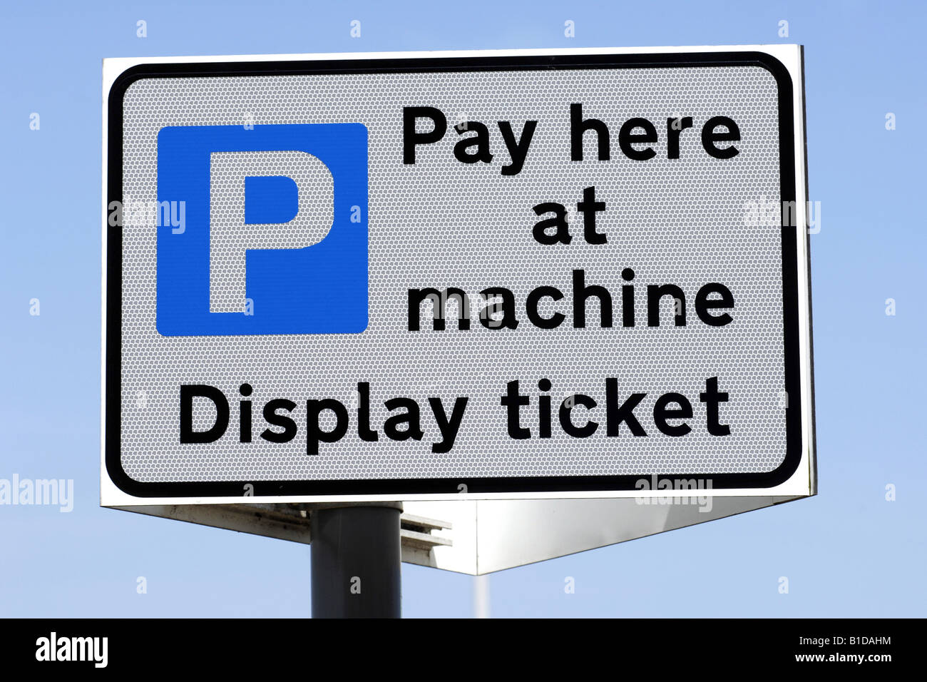 Parking ticket machine signpost in England Stock Photo - Alamy