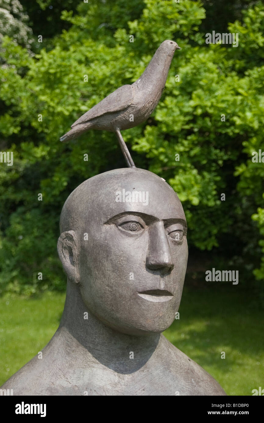 Sculpture of Pigeon perched on Man's Head Stock Photo - Alamy