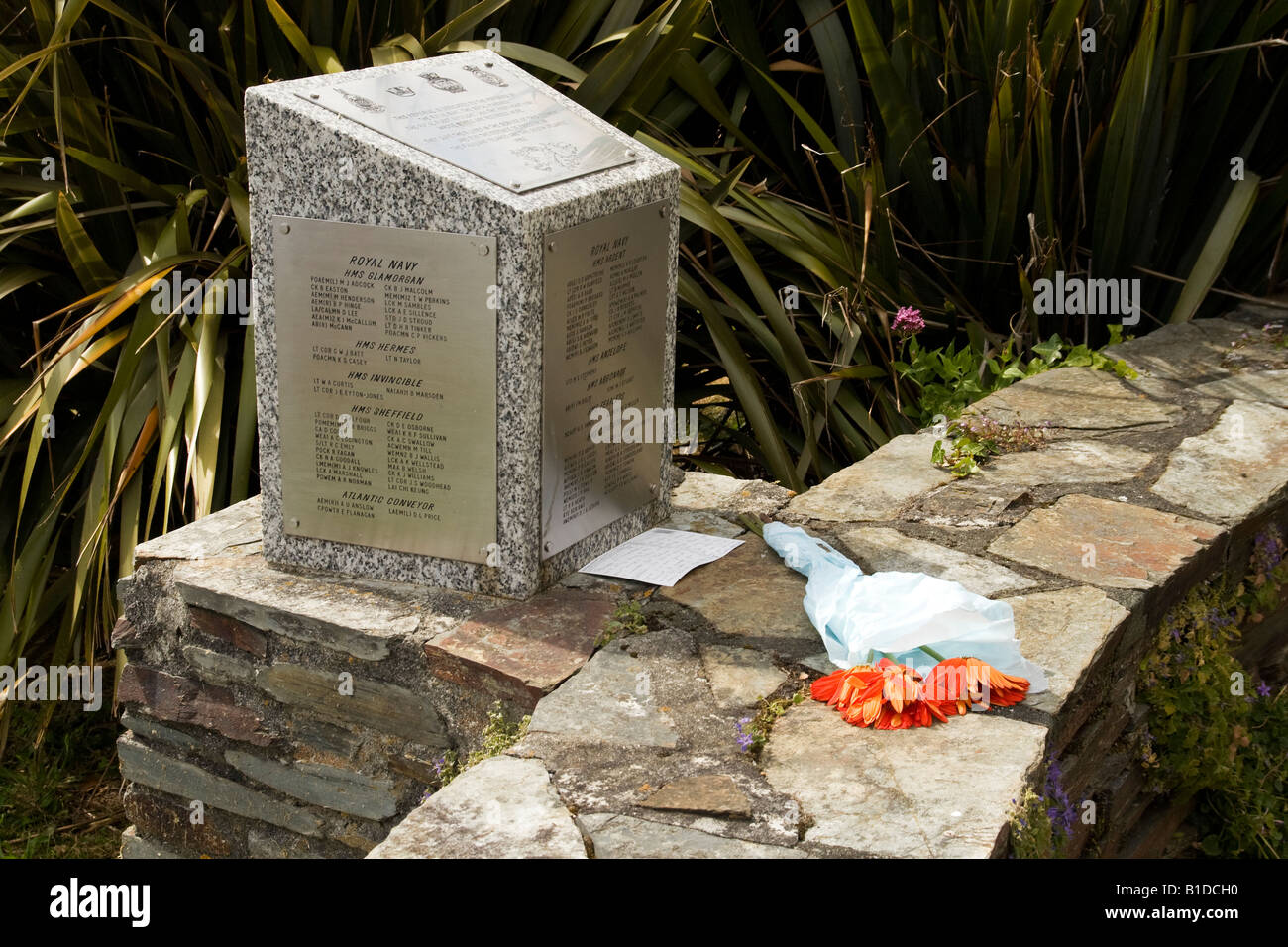 Lone flowers left in silent memory Stock Photo - Alamy