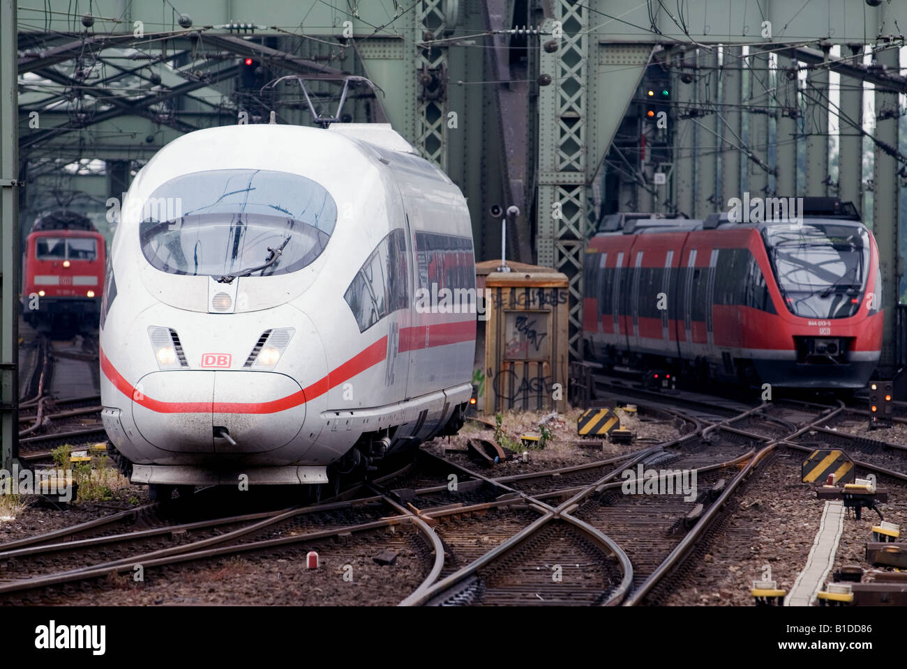 Germany Railways passenger trains crossing the river Rhine in Cologne ...