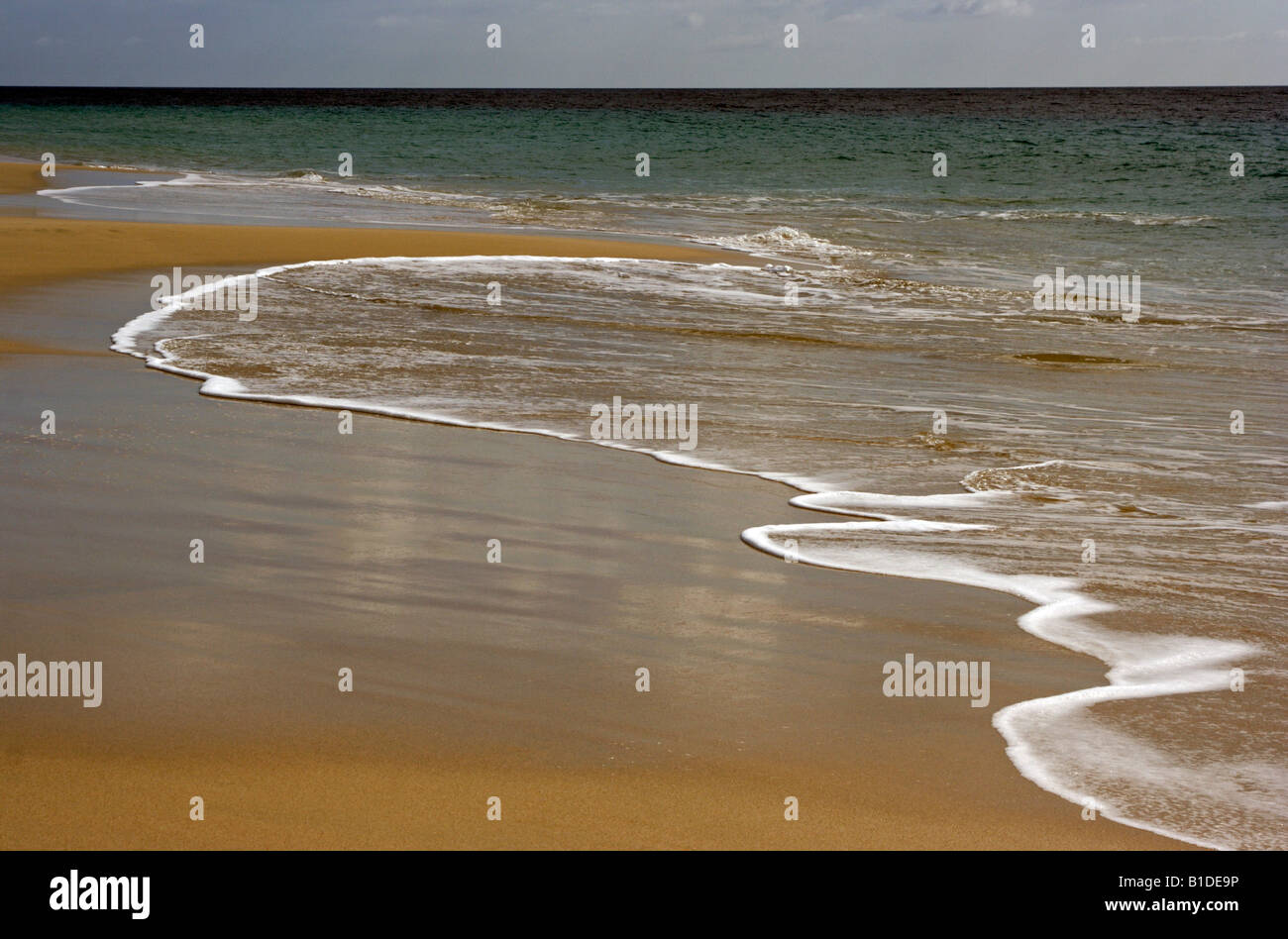 Wave patterns on the beach Stock Photo - Alamy