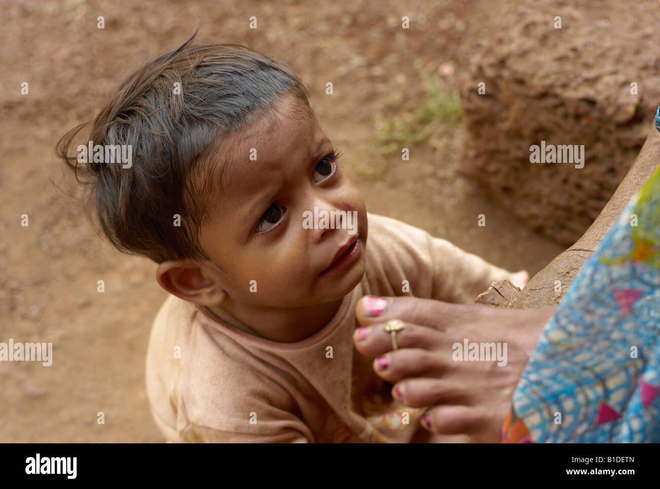 Indian child grumpy Stock Photo - Alamy