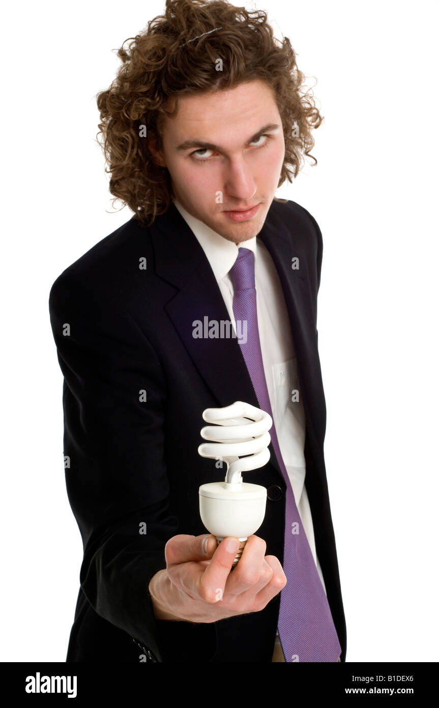 Man with an ecological light bulb in hand Stock Photo - Alamy