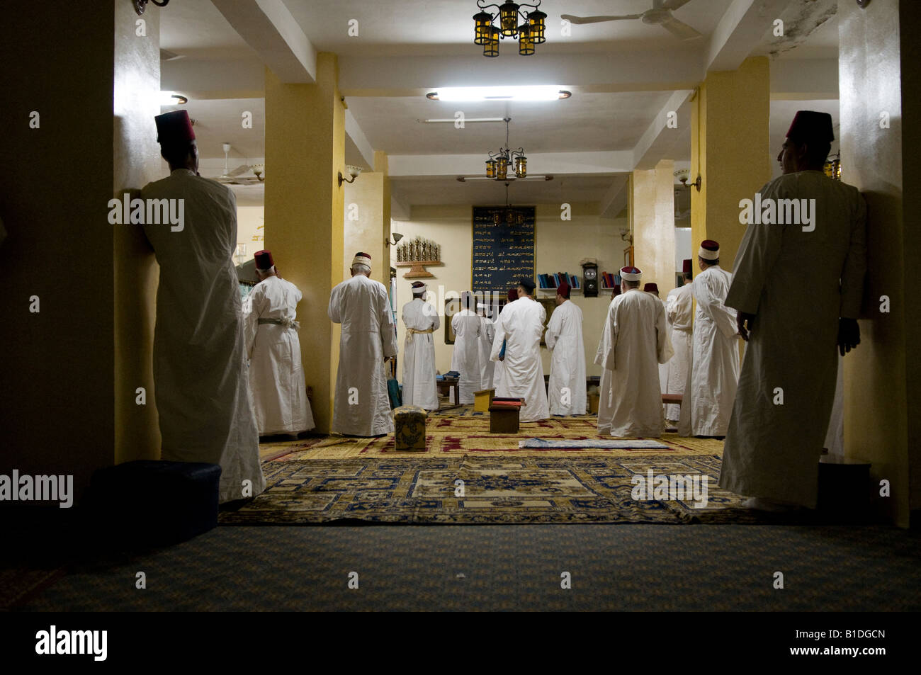 Members of the Samaritan sect pray in a synagogue to mark Shavuot Feast ...