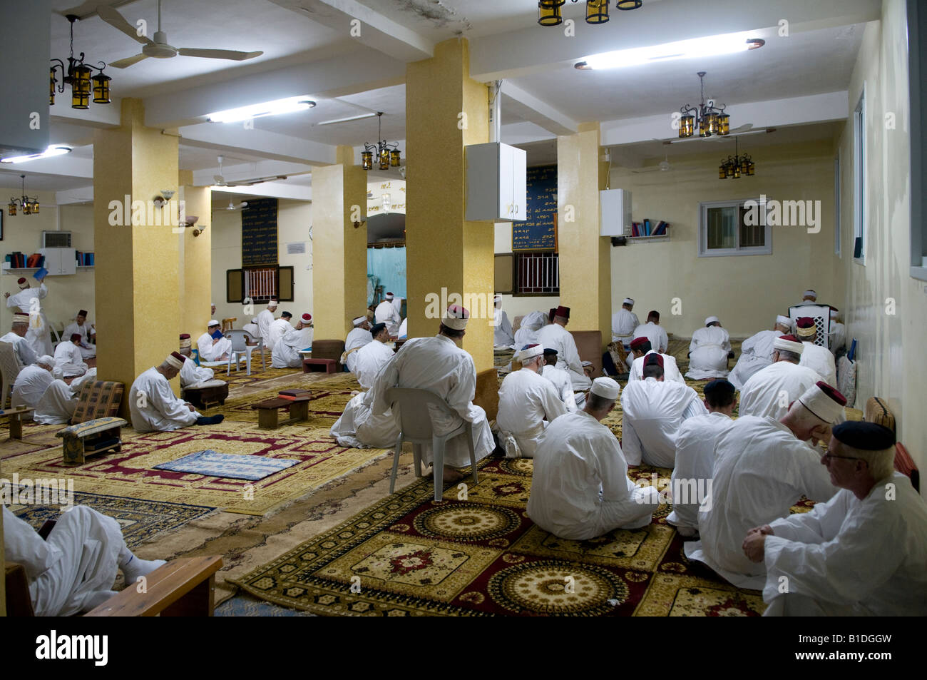 Members of the Samaritan sect pray in a synagogue to mark Shavuot Feast ...
