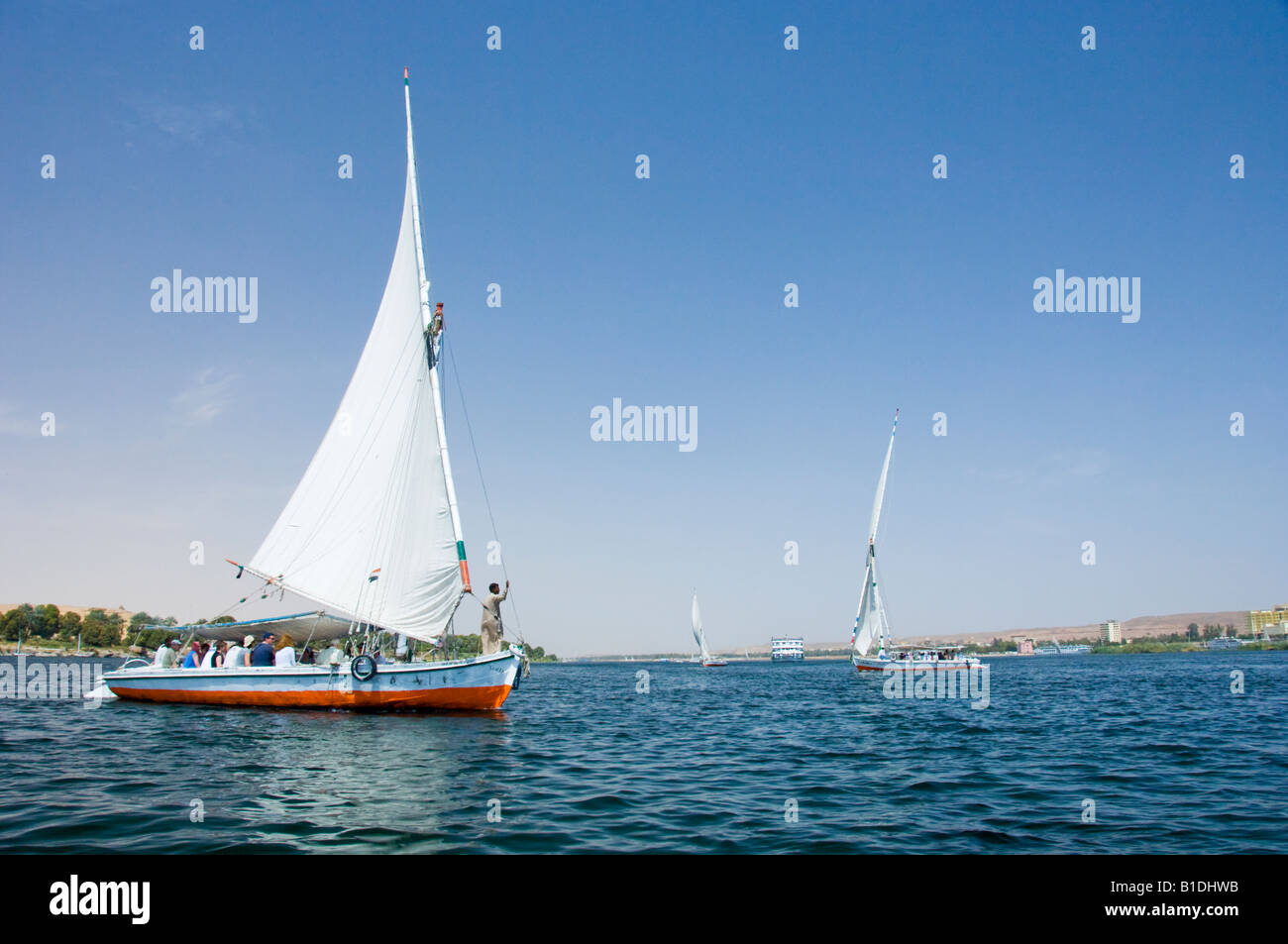 Felucca sailboats on the Nile River at Aswan Egypt Stock Photo - Alamy