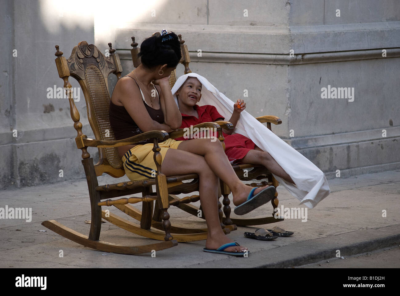 Couple in rocking chairs hi-res stock photography and images - Alamy