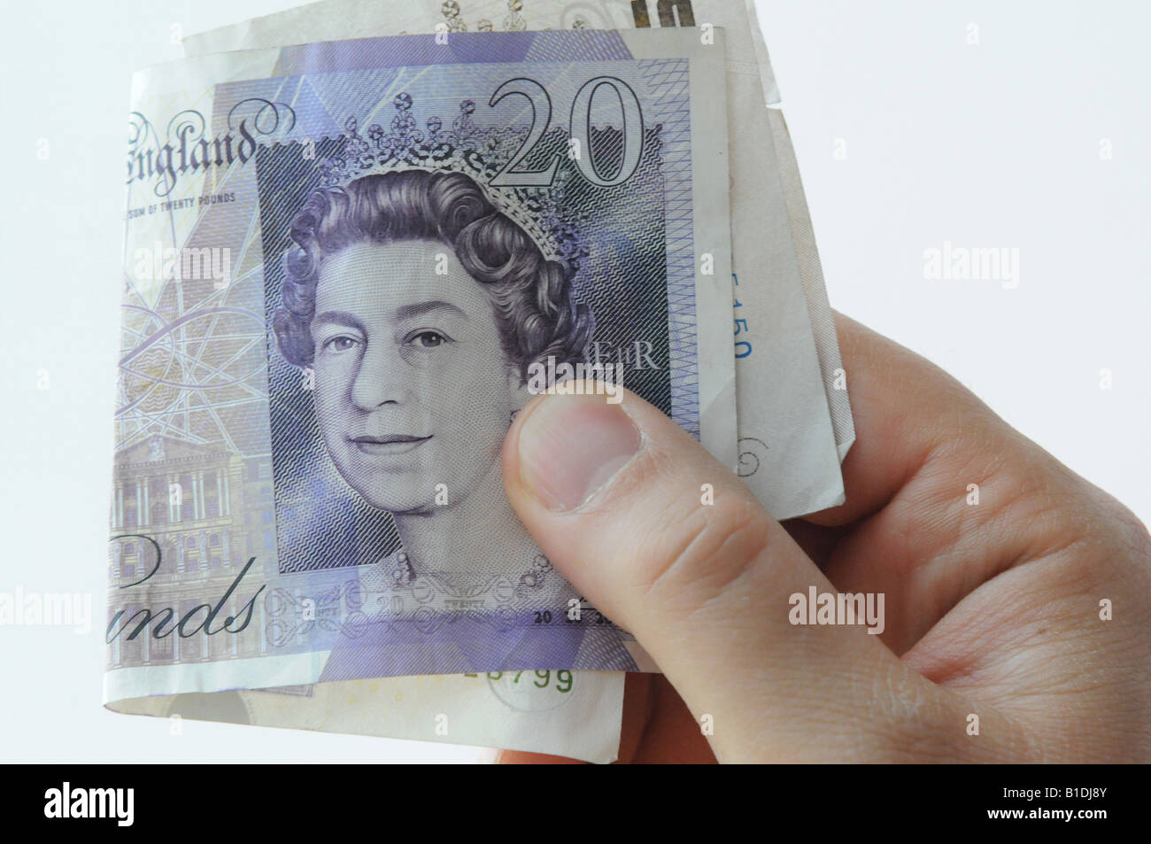£10 pound notes in the hand Stock Photo - Alamy