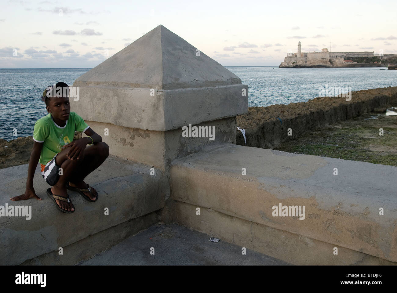 Squatter boy on the Malecón, Havana Stock Photo - Alamy