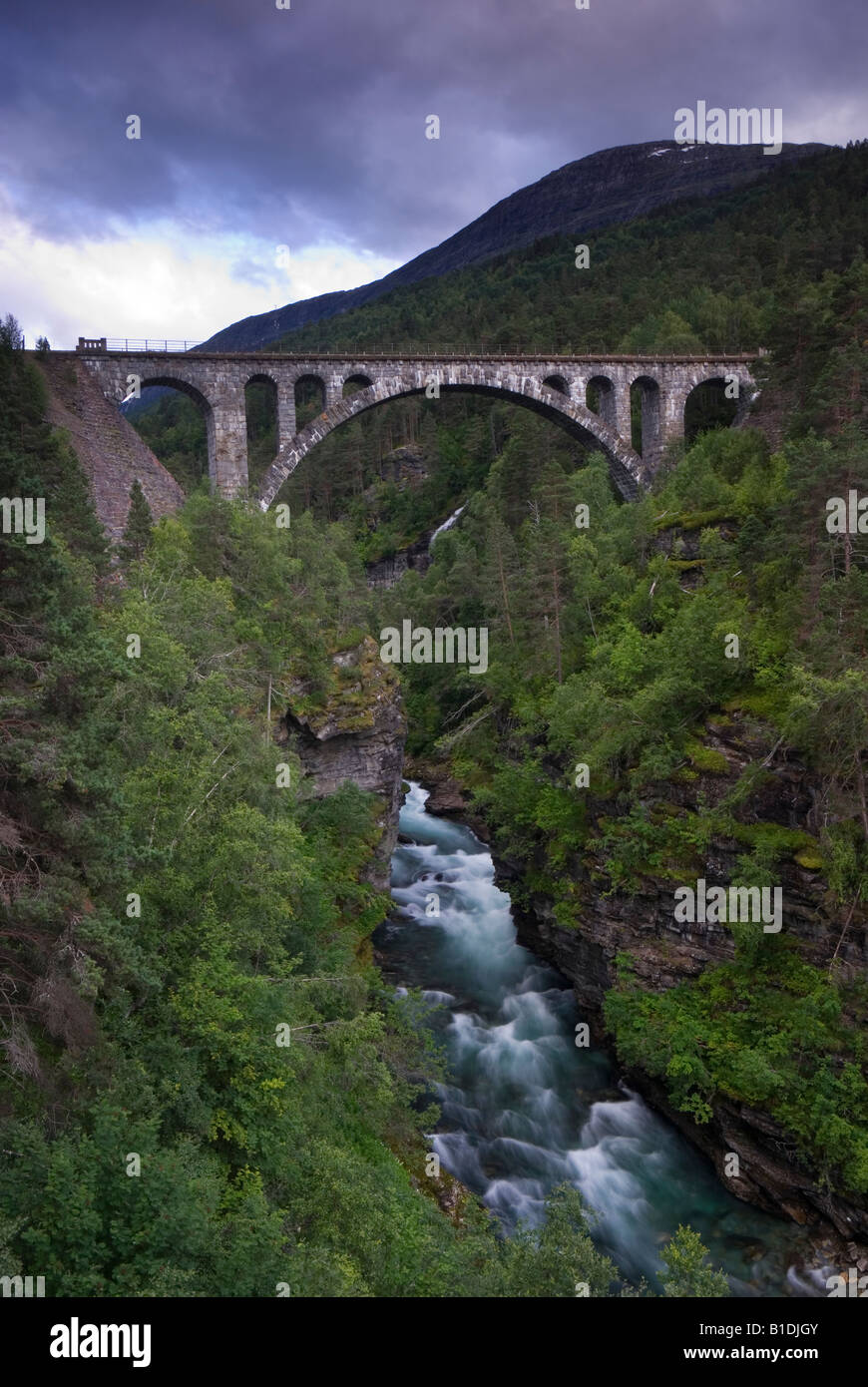 Kylling Bridge over Rauma river in Romsdal alps, Norway Stock Photo - Alamy