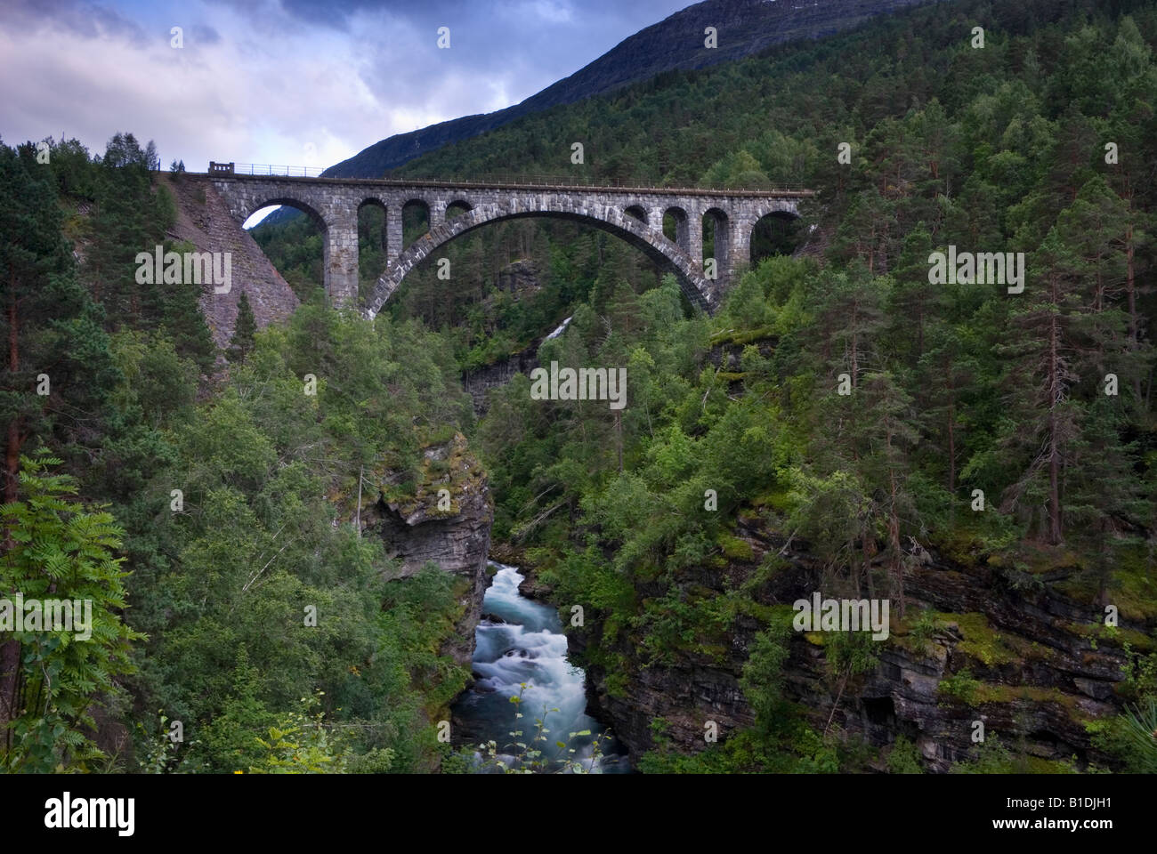 Kylling Bridge over Rauma river in Romsdal alps, Norway Stock Photo - Alamy